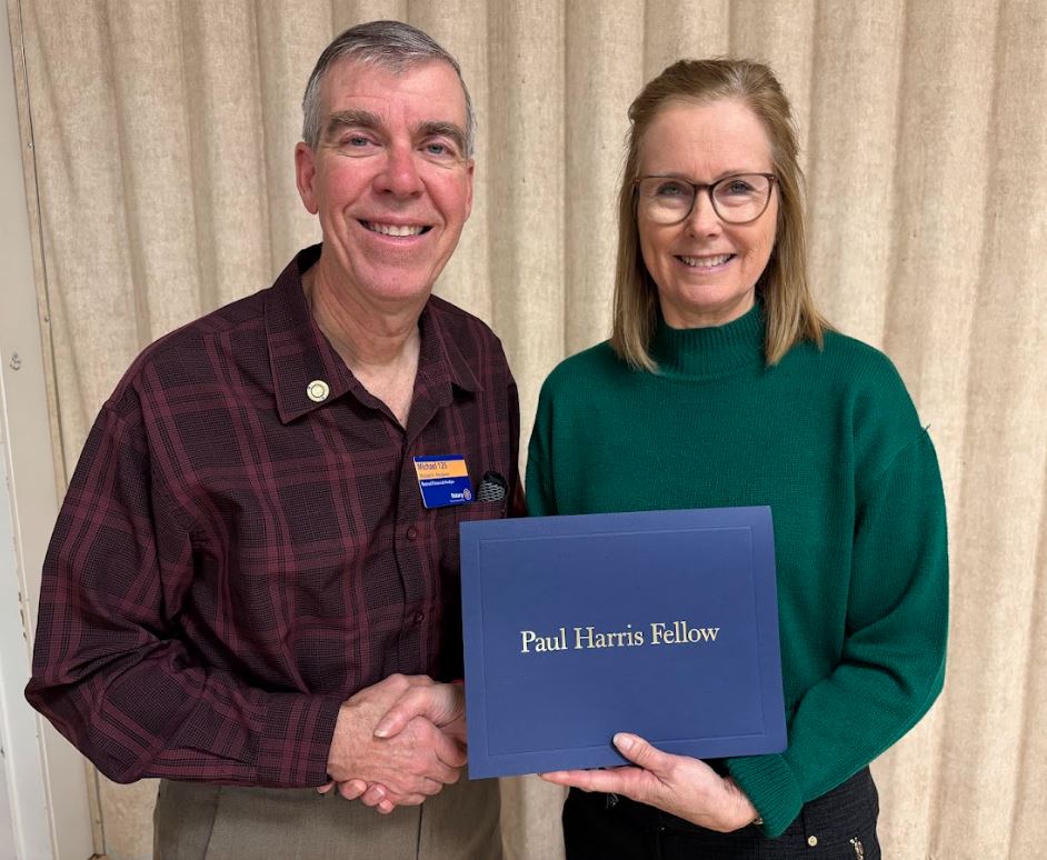 Executive director honored as Paul Harris Fellow - The Community Foundation